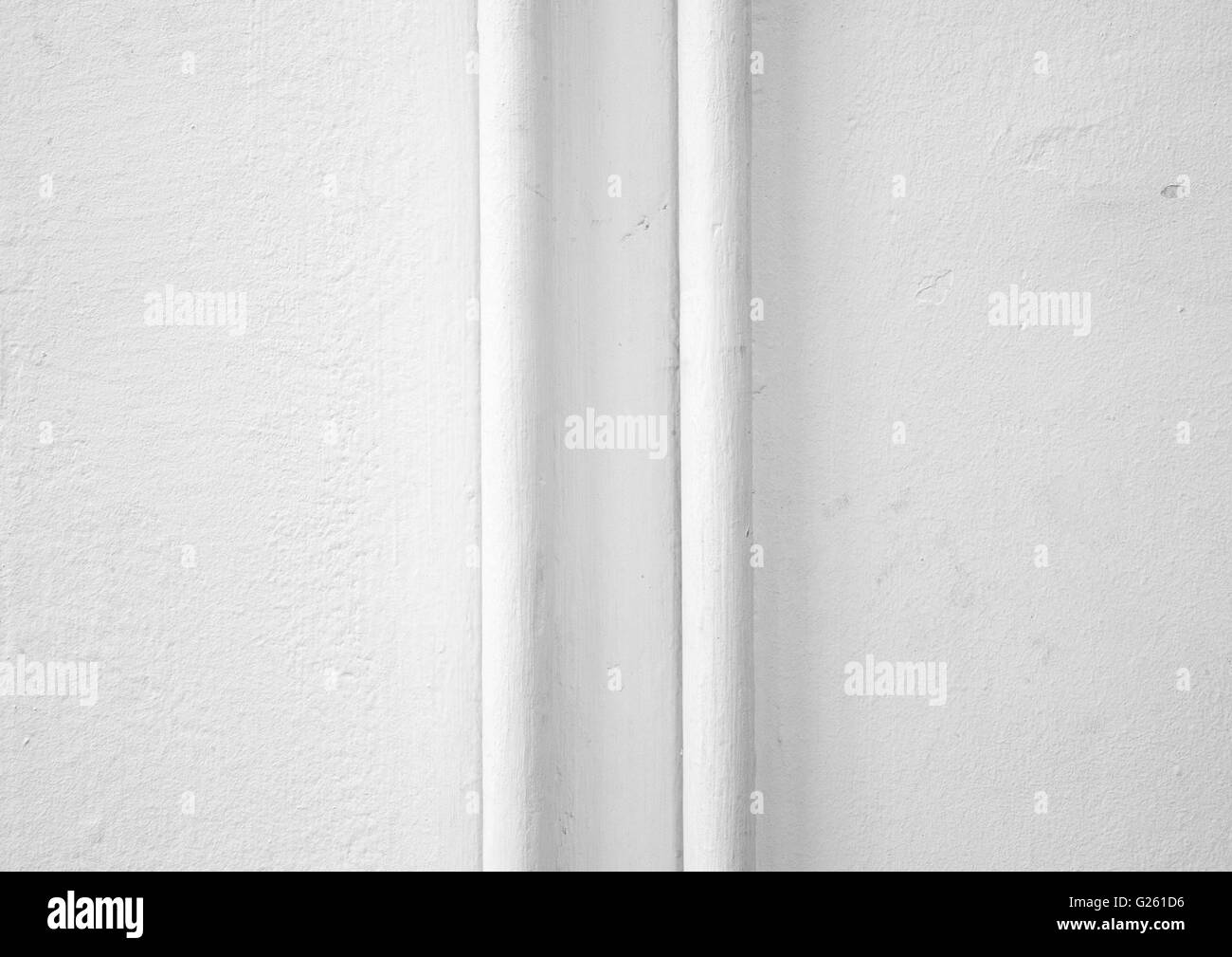 Texture of rough white wall with white pipes outdoors creating a nice ...