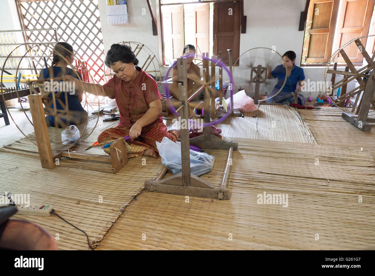 Thai women working with Old Silk weaving Handicraft machine Tai Dam ...