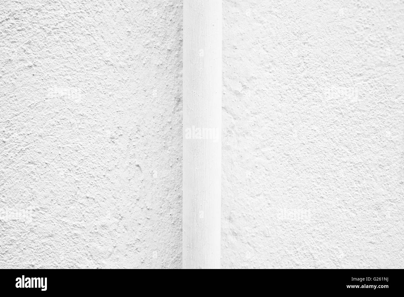 Texture of rough white wall with white pipe outdoors creating a nice ...
