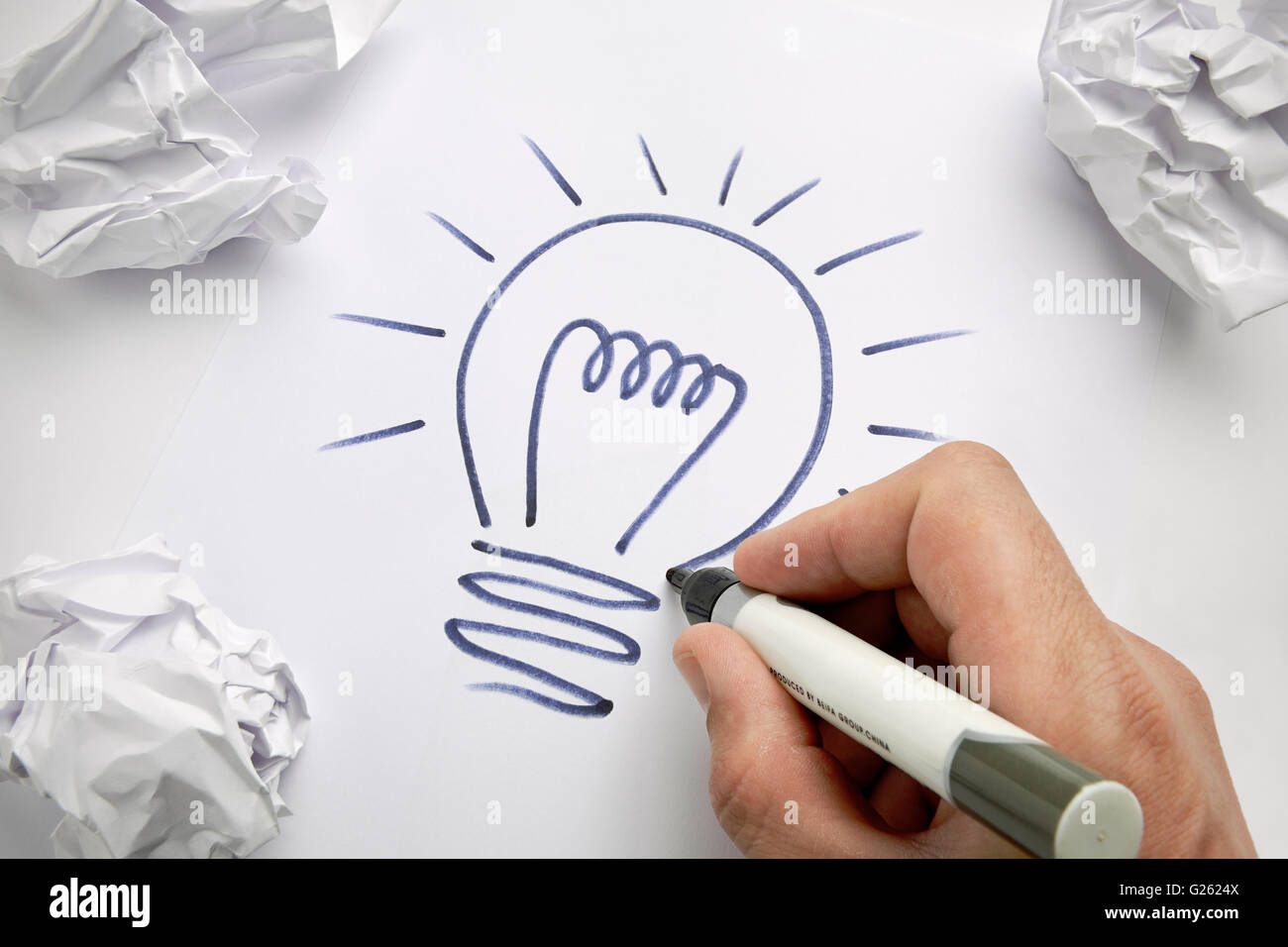 Lightbulb Drawn Onto Paper Whilst Brainstorming for an Idea Stock Photo ...