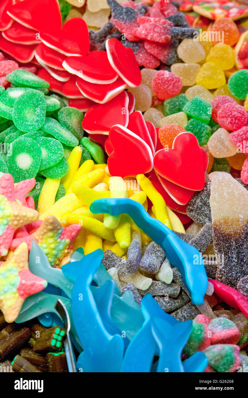Mixed colorful sweets with different forms Stock Photo - Alamy