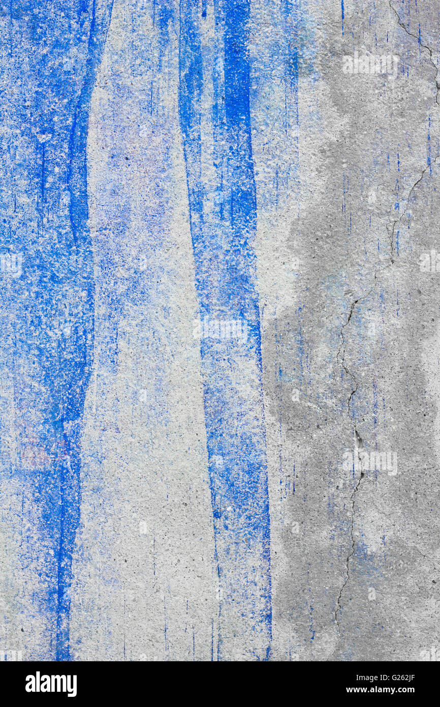 Grunge and old damaged wall that makes a colorful abstract composition ...