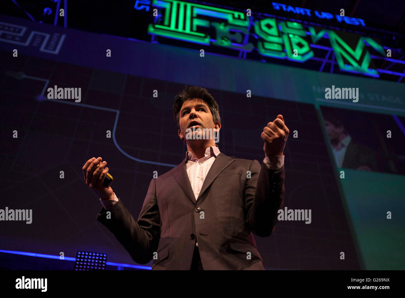 Travis Cordell Kalanick, co-founder of Uber, gives a speech at Startup ...