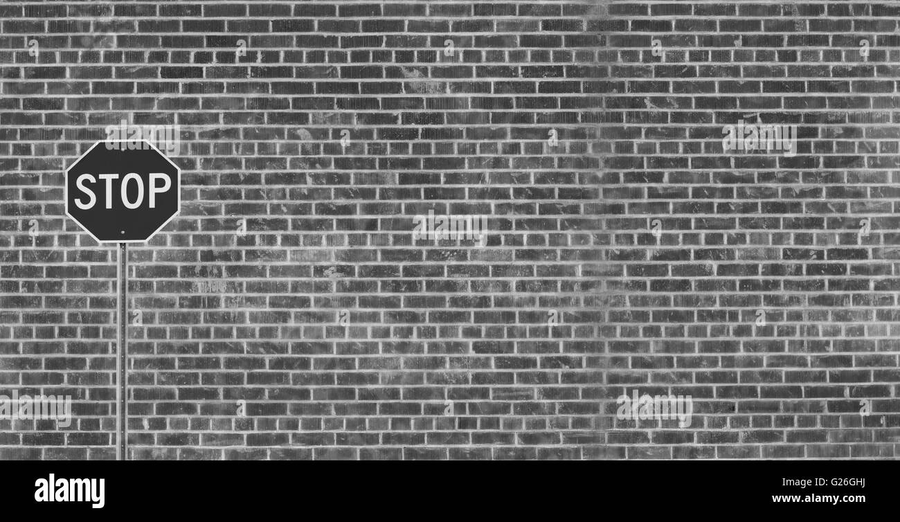 Stop Sign - Stop Sign Brick Wall in Black and White Stock Photo - Alamy