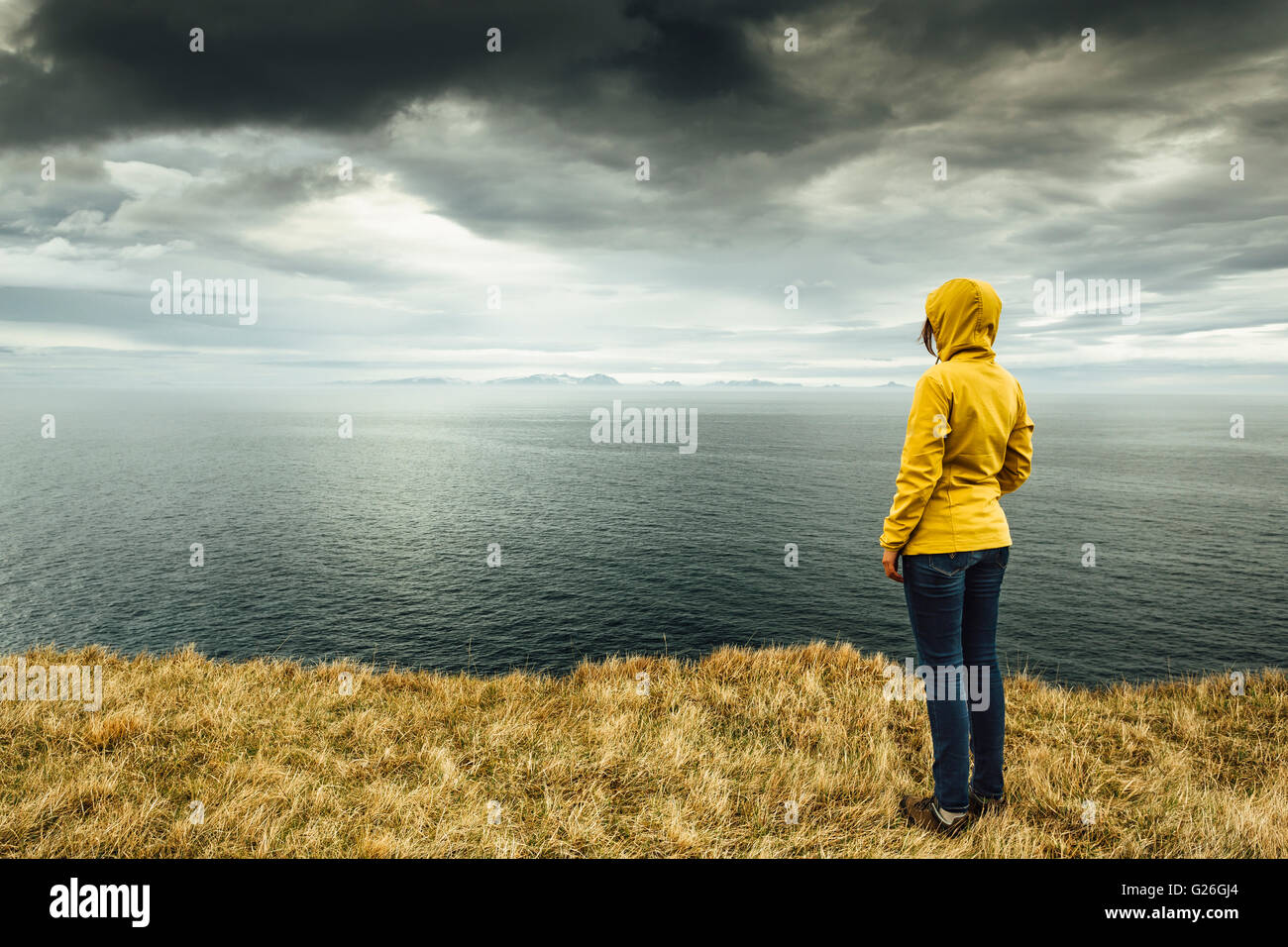 Woman contemplating a beautiful landscape Stock Photo - Alamy