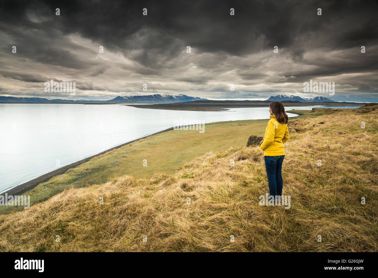 Woman contemplating a beautiful landscape Stock Photo - Alamy