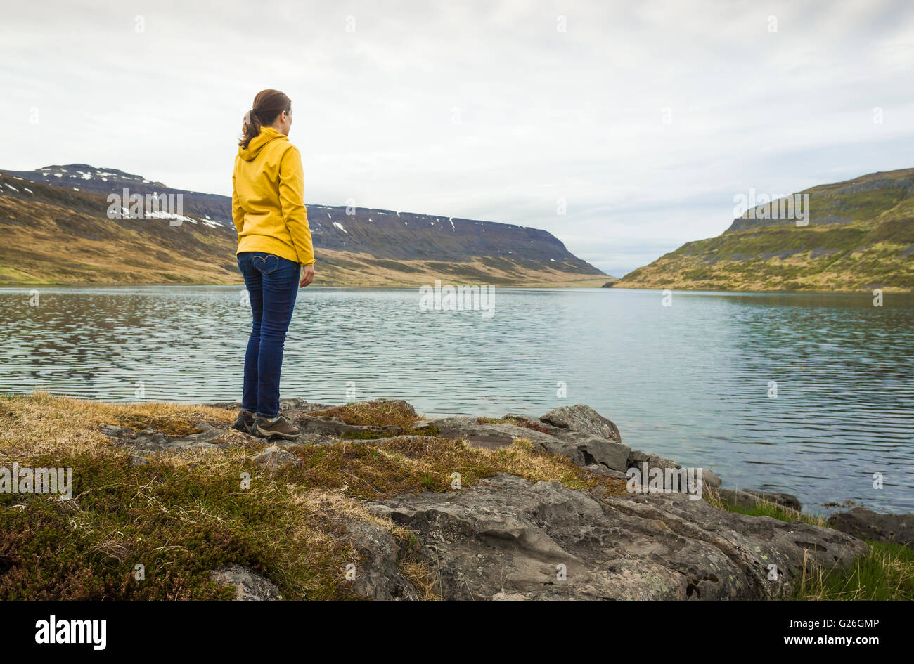 Woman contemplating a beautiful landscape Stock Photo - Alamy