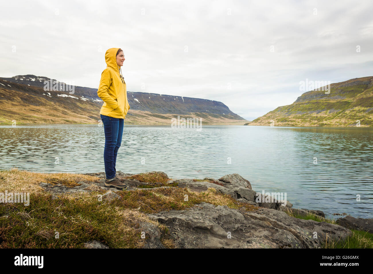 Woman contemplating a beautiful landscape Stock Photo - Alamy