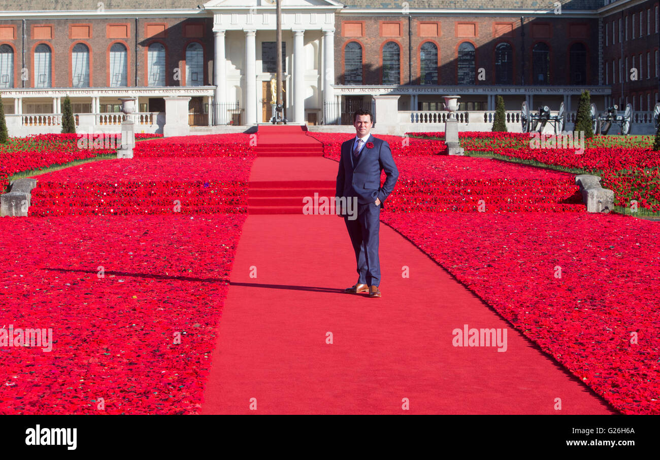 Phillip Johnson stands at the 5000 Poppies creation which he designed ...