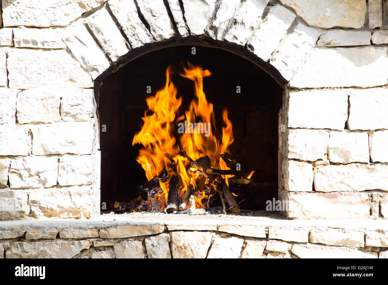 Fire burning in fireplace energy hi-res stock photography and images ...
