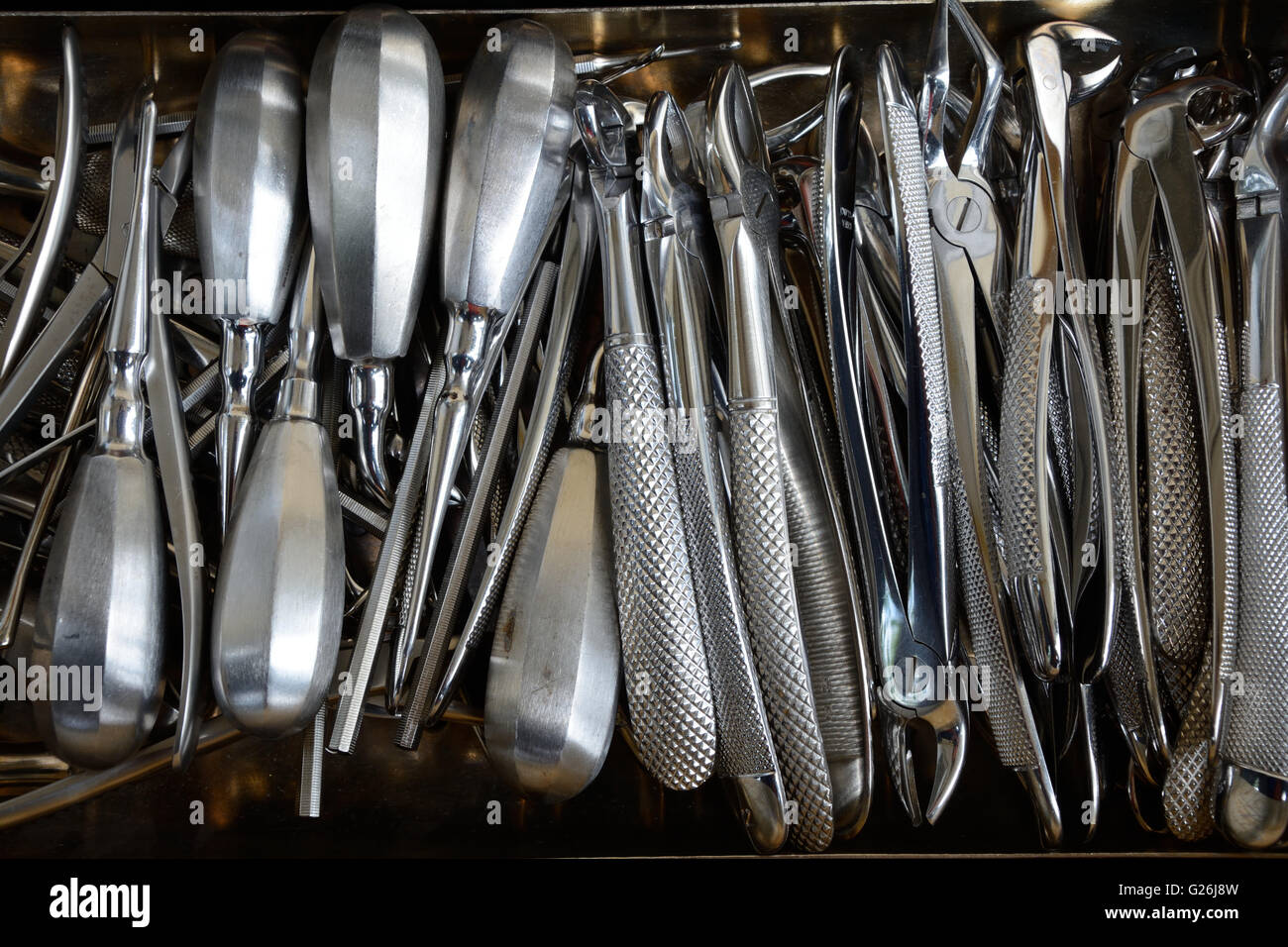Plenty of dental tools in stainless steel box Stock Photo - Alamy