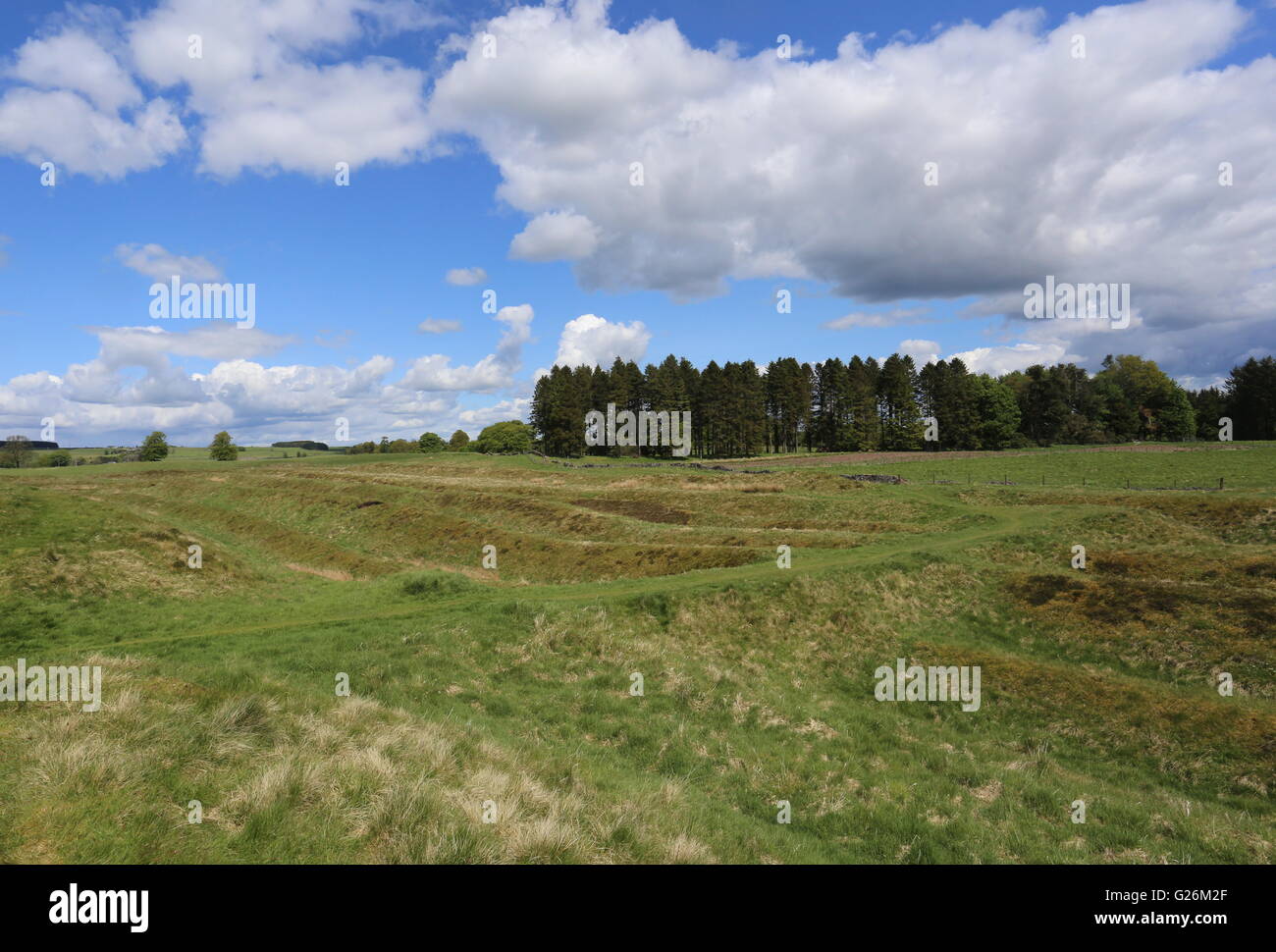 Remains of ditches and ramparts and access road to Ardoch Roman Fort ...