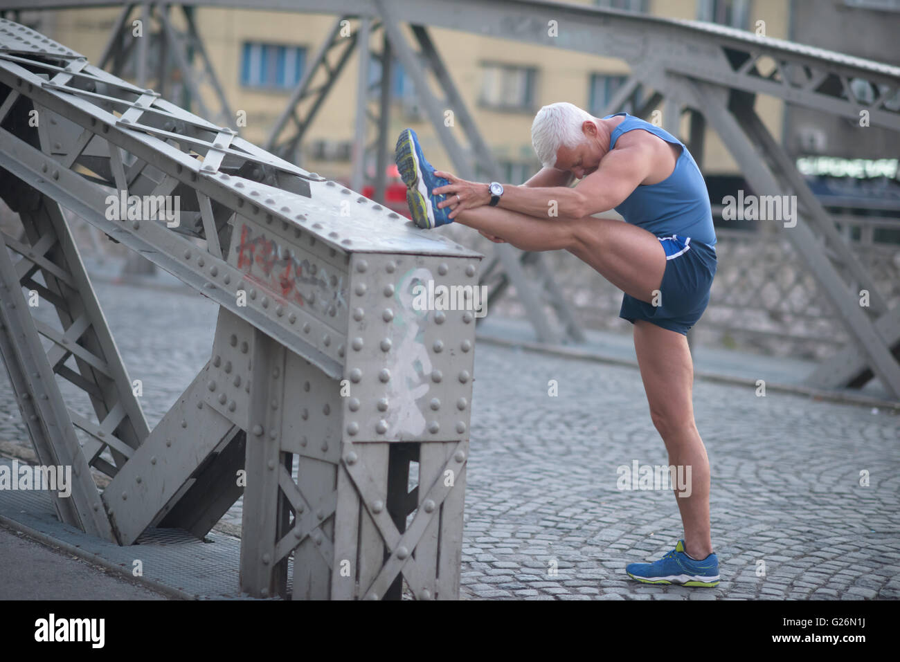 Retro man grey hair exercise hi-res stock photography and images - Alamy