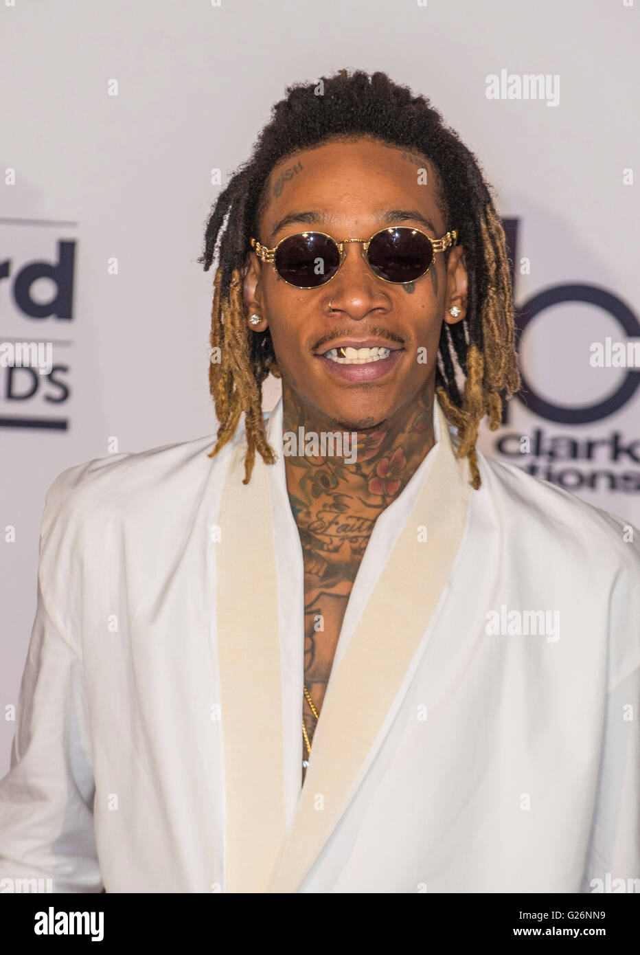 Recording artist Wiz Khalifa poses in the press room at the 2016 ...