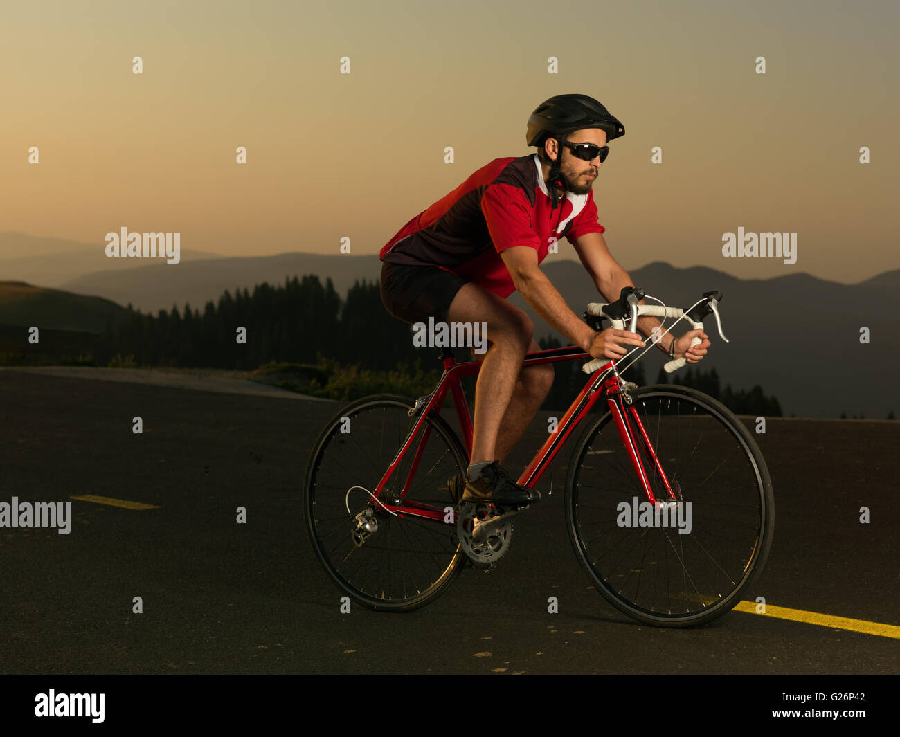 cyclist on road bike in motion on a sunny day Stock Photo - Alamy