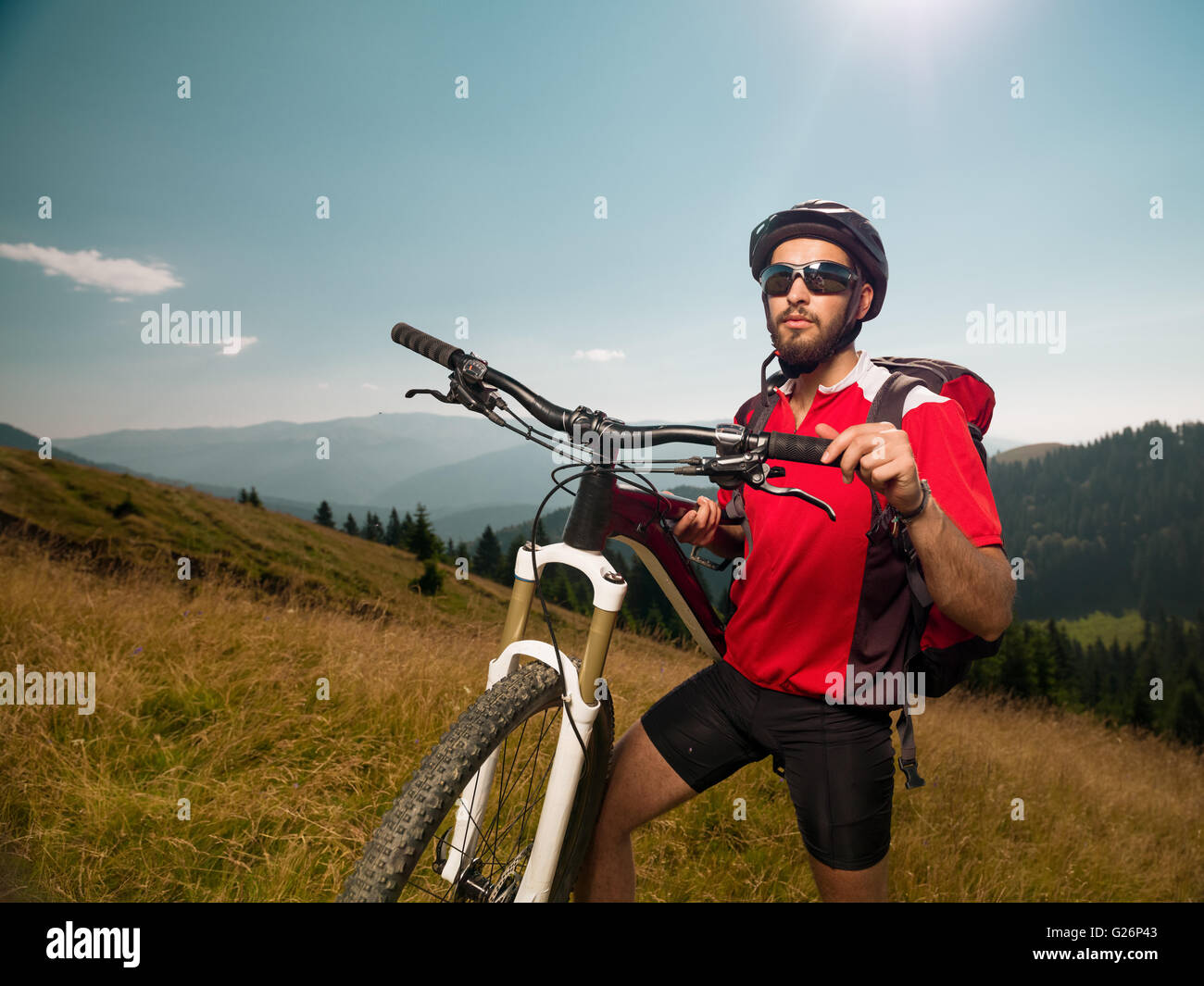 Man pushing a bike hi-res stock photography and images - Alamy