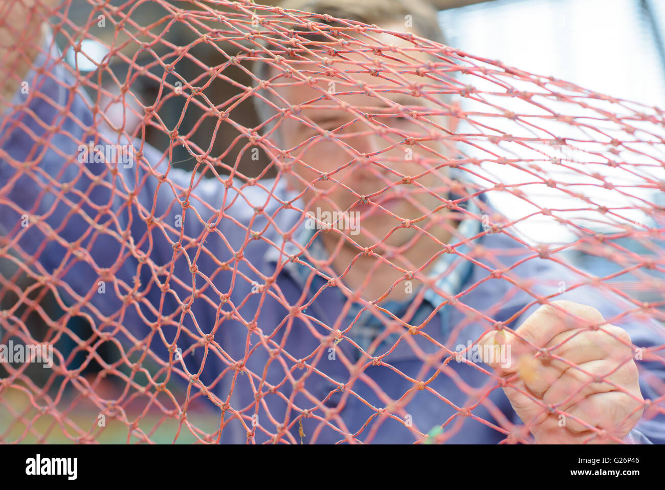 Fishing net repair hi-res stock photography and images - Alamy