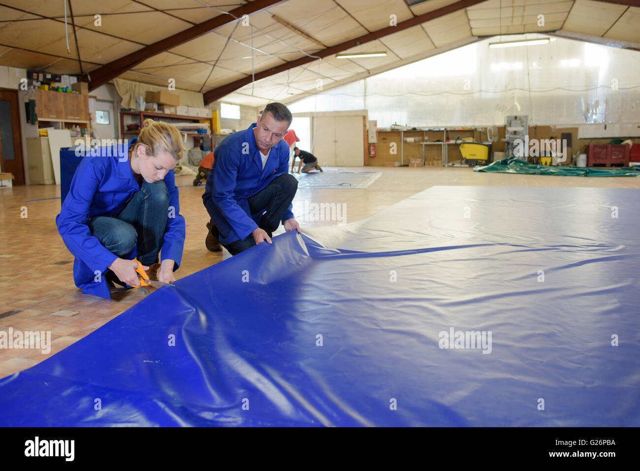 Cutting out fabric hi-res stock photography and images - Alamy