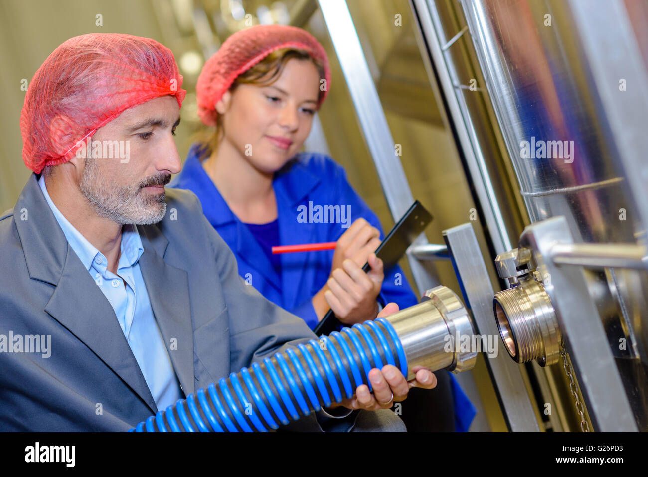 connecting a pipe Stock Photo - Alamy