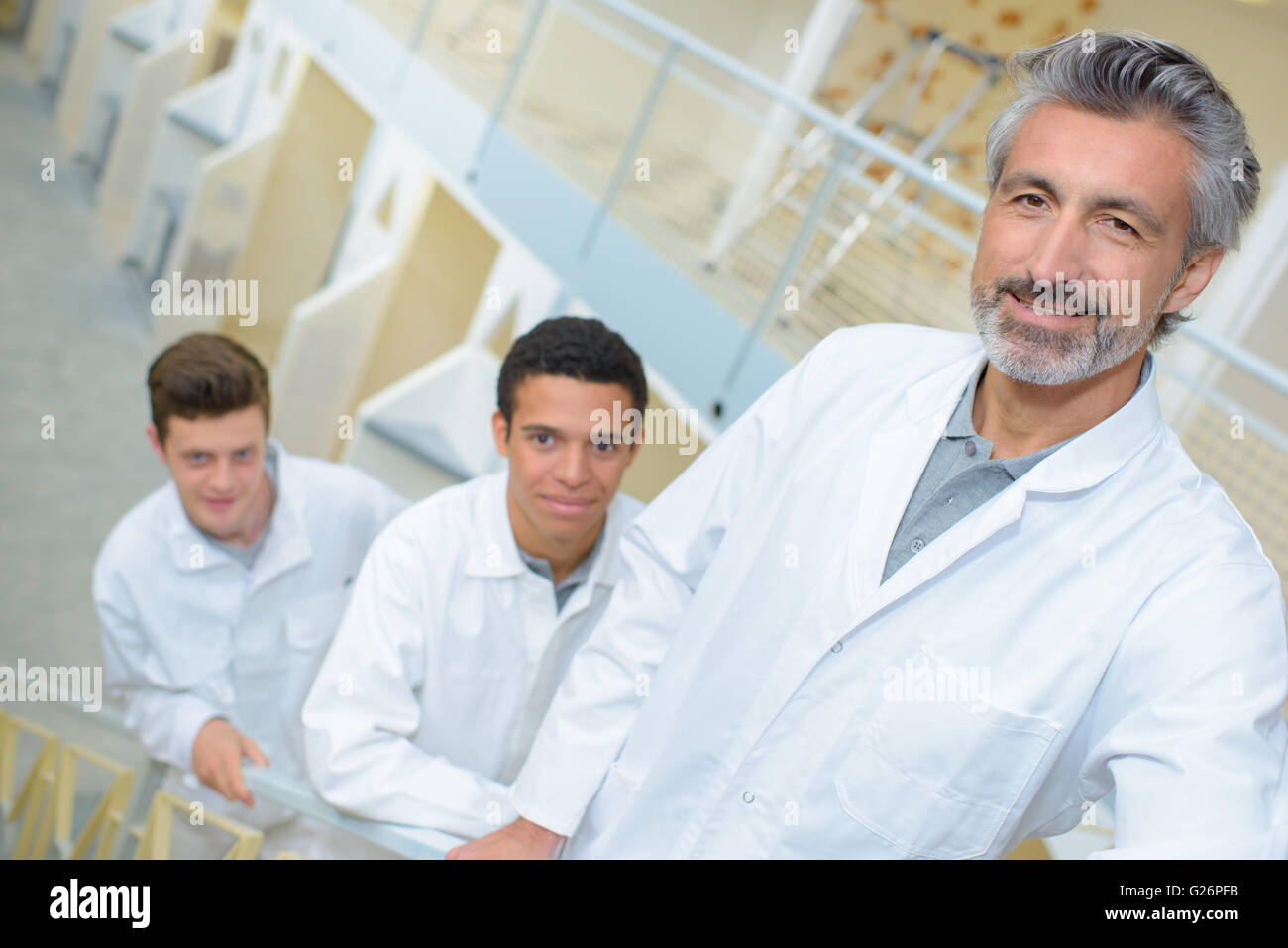 Three men posing in the uniform hi-res stock photography and images - Alamy