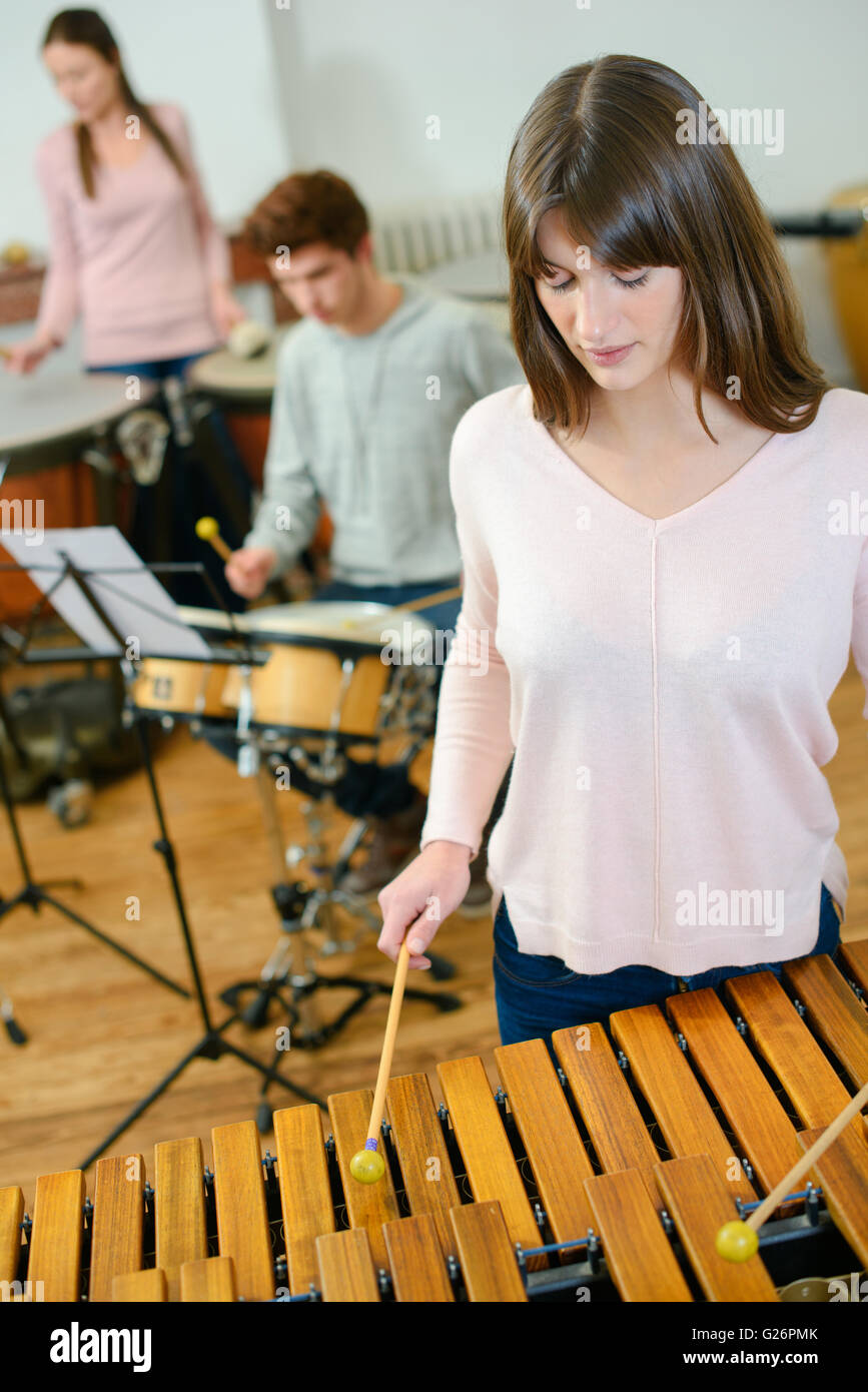 Woman playing xylophone hi-res stock photography and images - Alamy