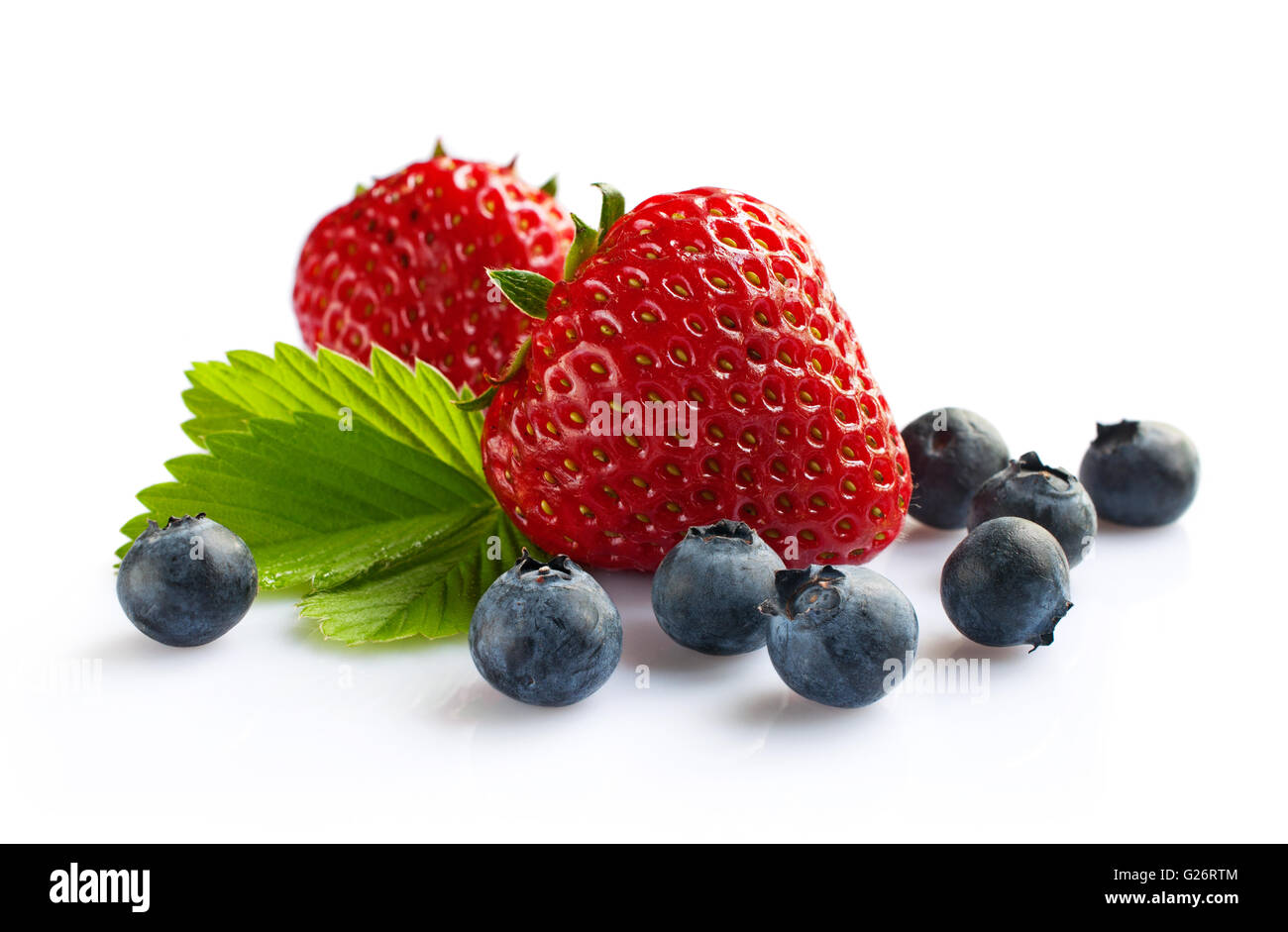 Strawberry and blueberry isolated on white Stock Photo - Alamy