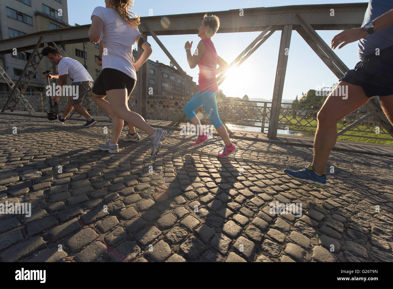 people group jogging runners team on morning training workout with ...
