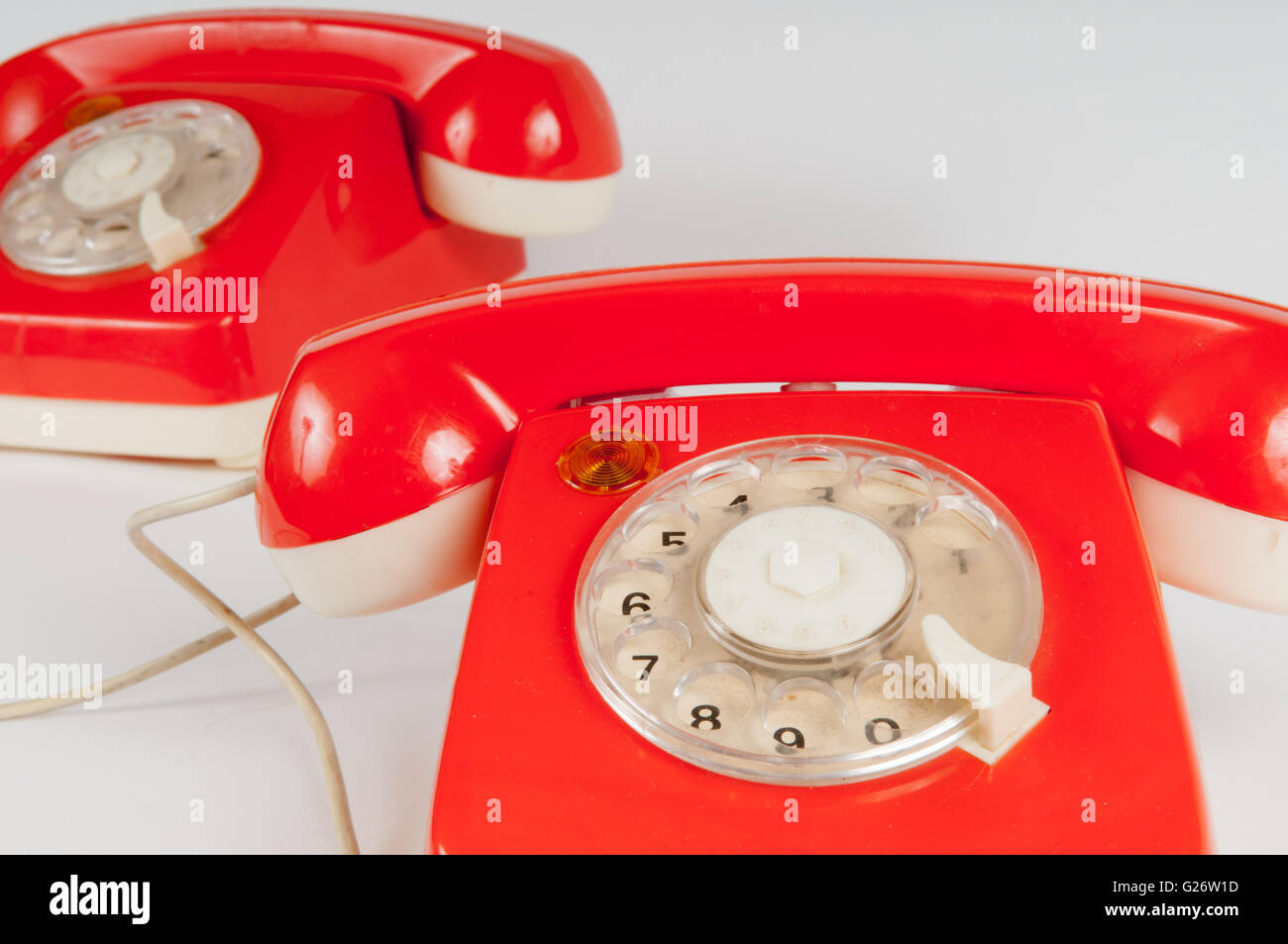 Orange vintage telephone taking a call, ideal for contact page Stock ...