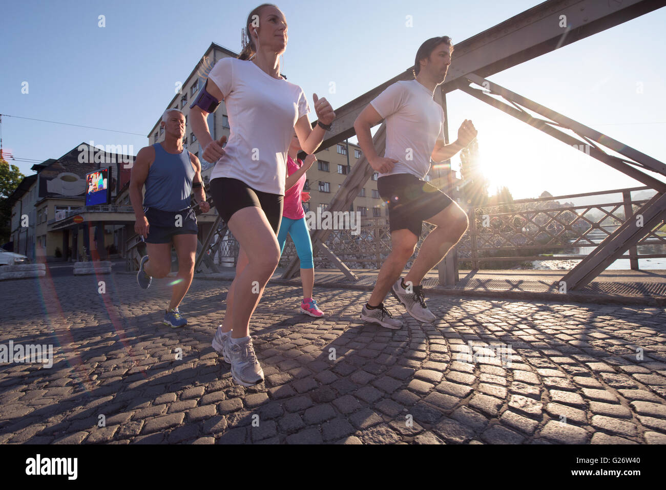 people group jogging runners team on morning training workout with ...