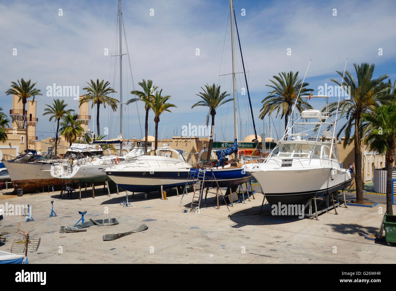 Boats on stilts being repaired, dry dock, boat yard, in marina of ...