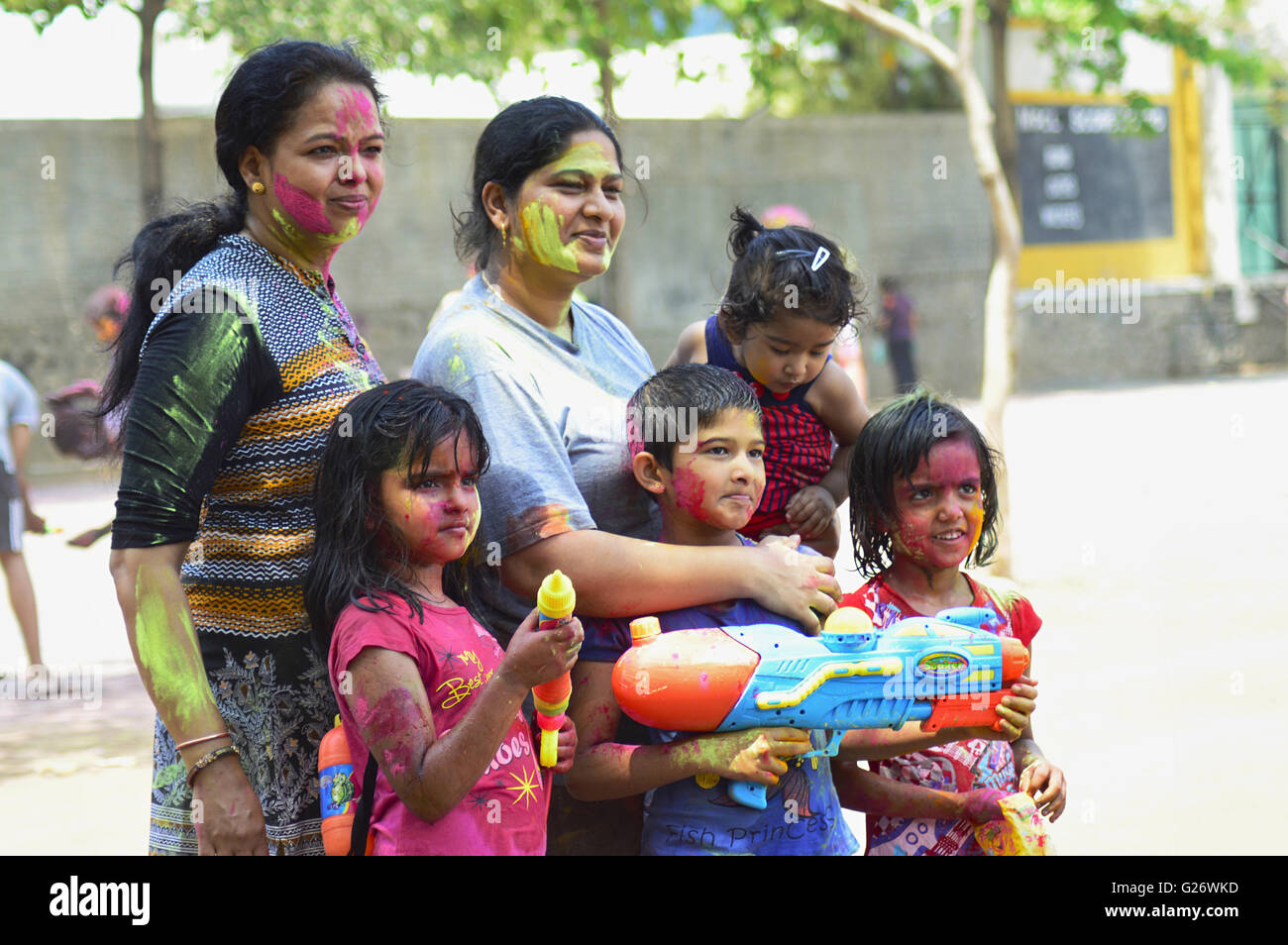 People celebrating Holi (Festival of Colours), Pune, Maharashtra, India ...
