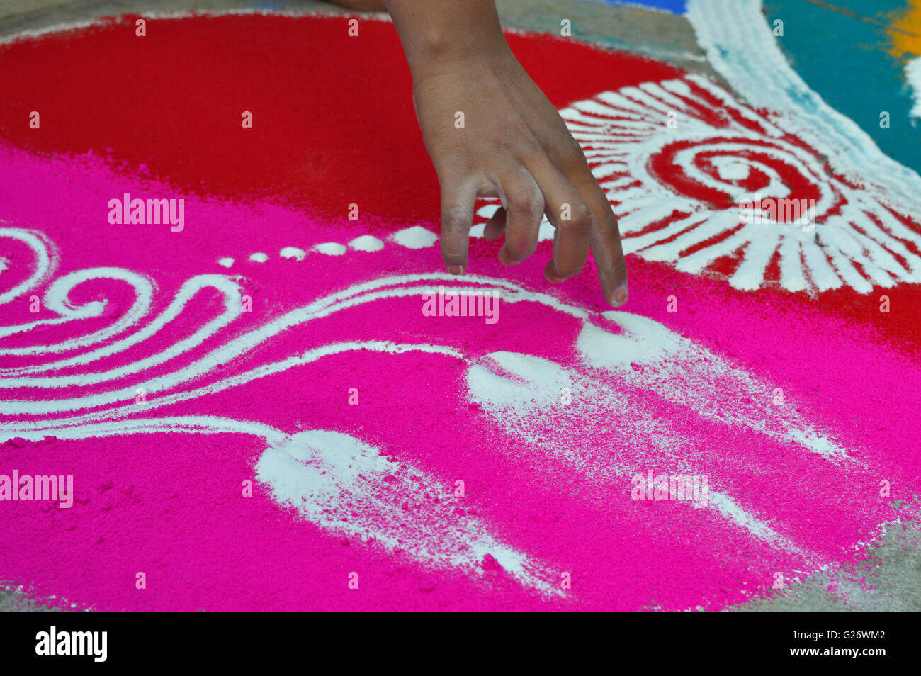 A lday drawing rangoli, Pune, Maharashtra, India Stock Photo - Alamy