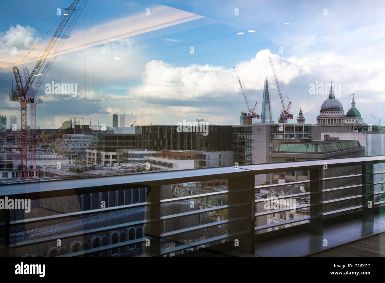 looking out of a London office block window with reflections on the ...