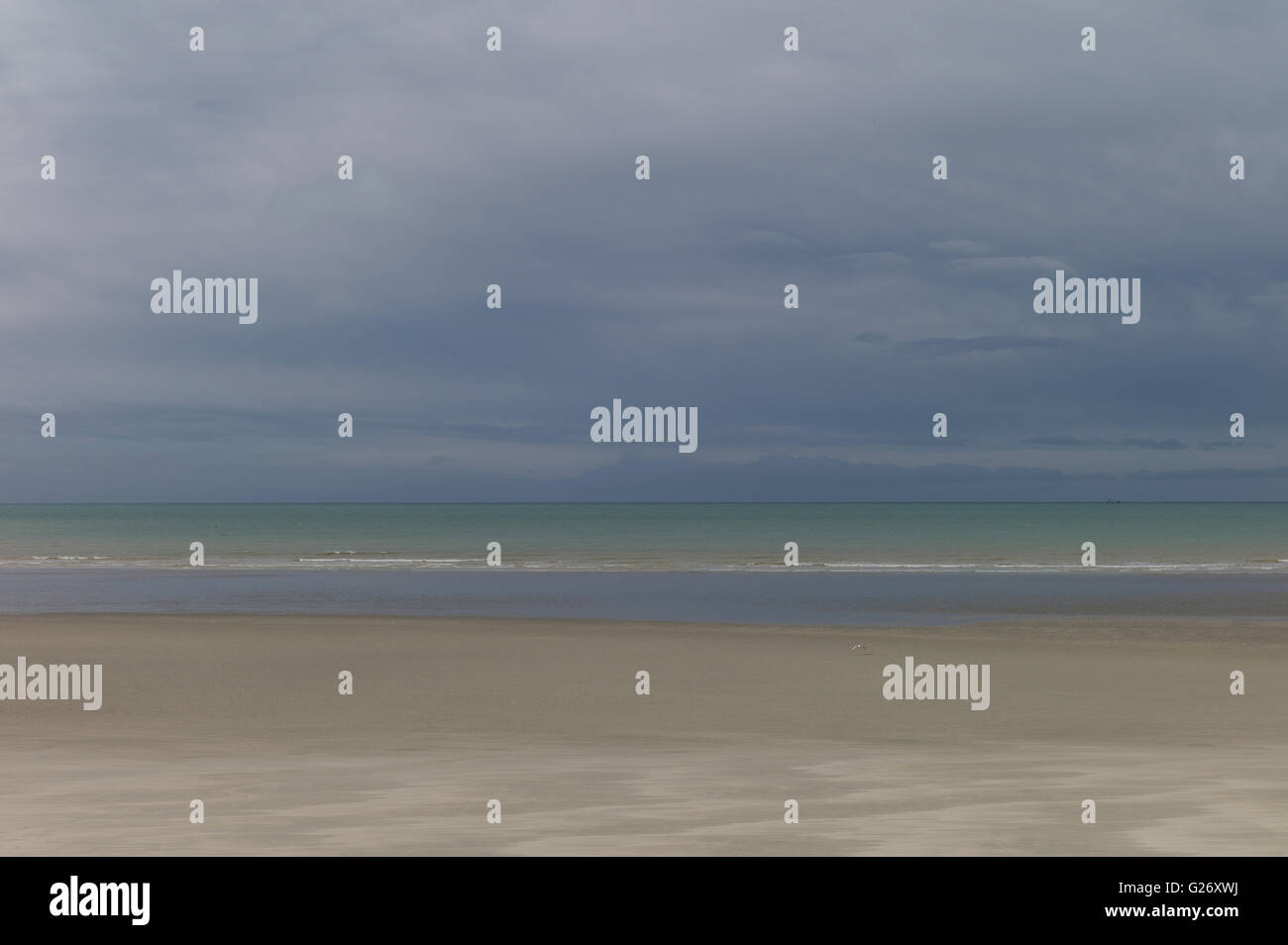 Empty sandy beach, low tide, Normandy, France Stock Photo - Alamy