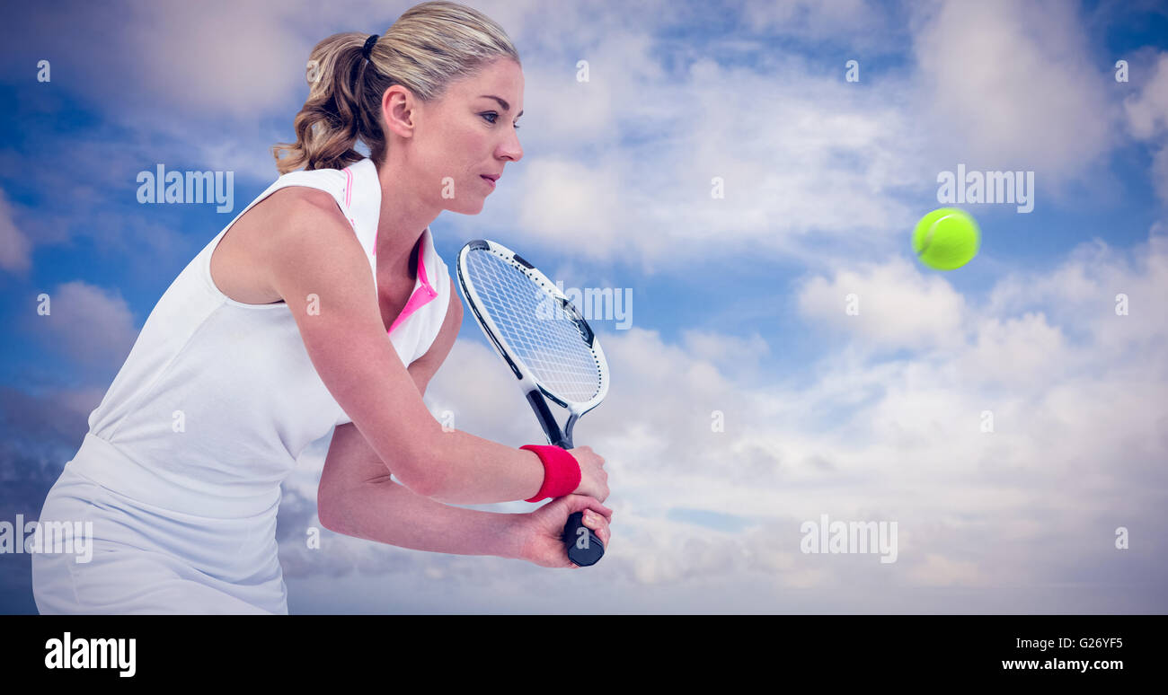 Composite image of athlete playing tennis with a racket Stock Photo - Alamy