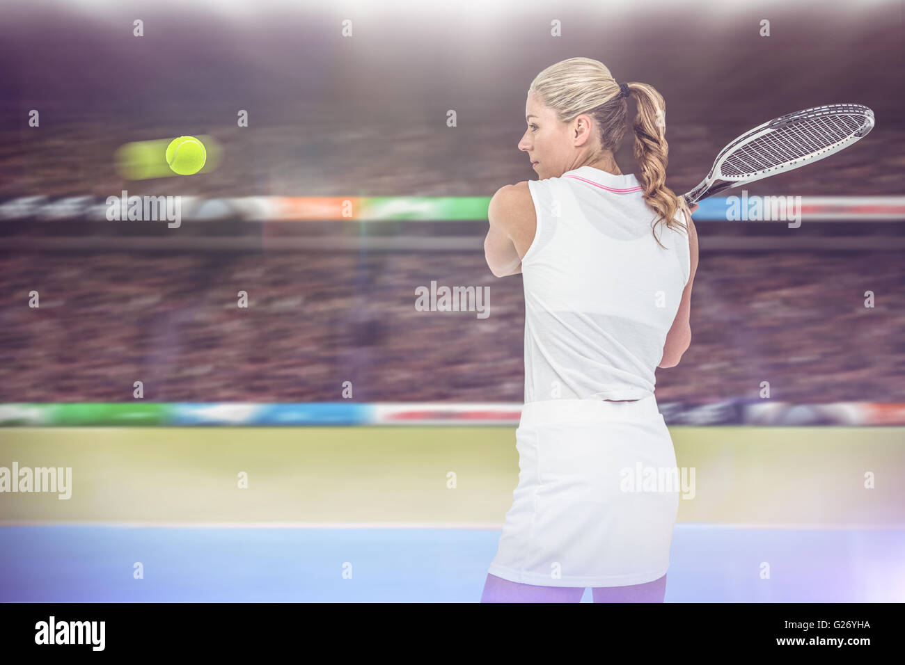 Composite image of athlete playing tennis with a racket Stock Photo - Alamy