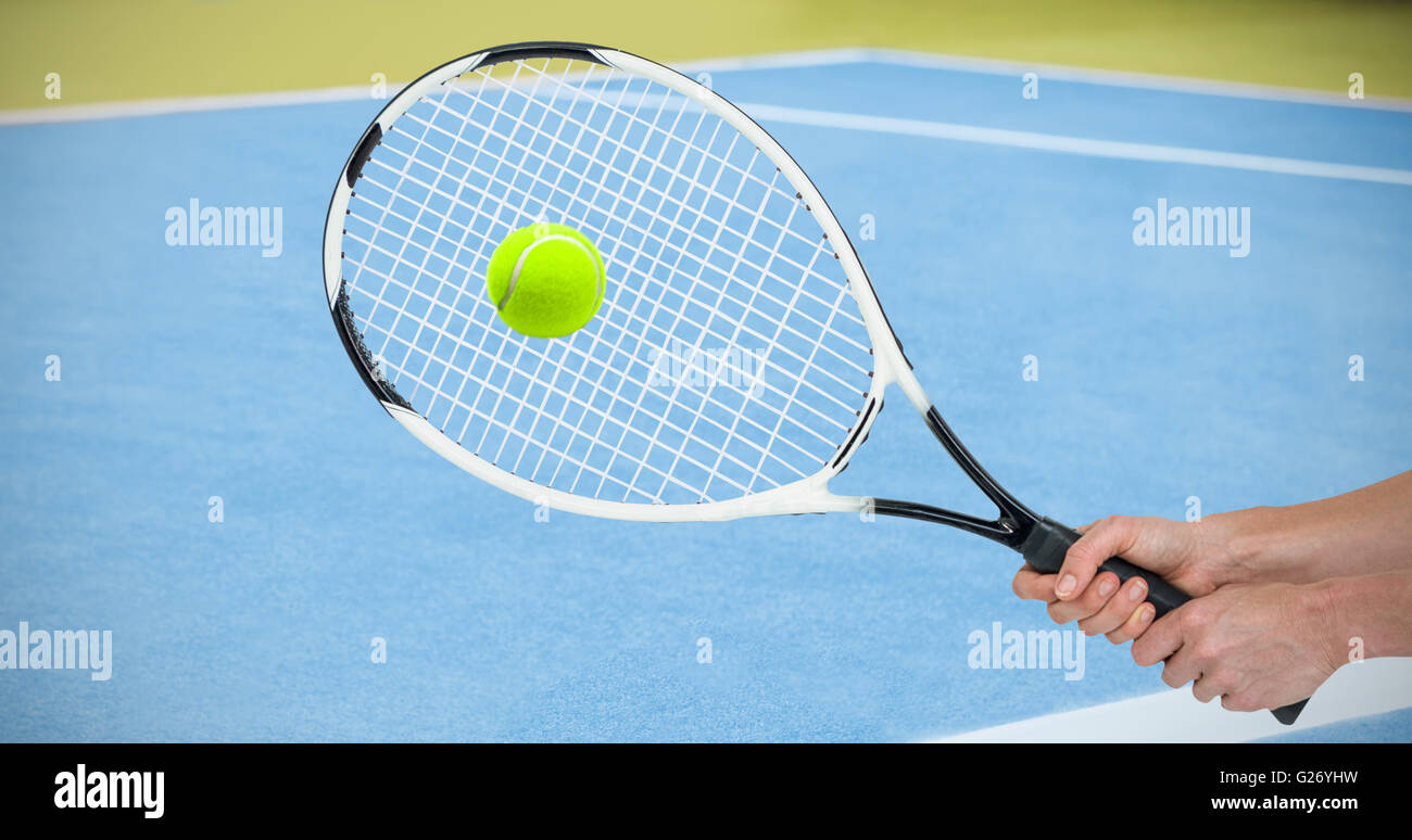 Composite image of athlete playing tennis with a racket Stock Photo - Alamy