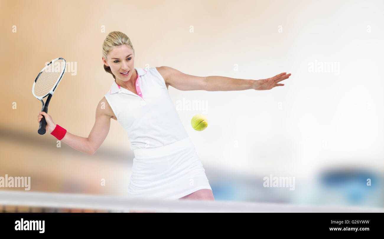 Composite image of athlete playing tennis with a racket Stock Photo - Alamy