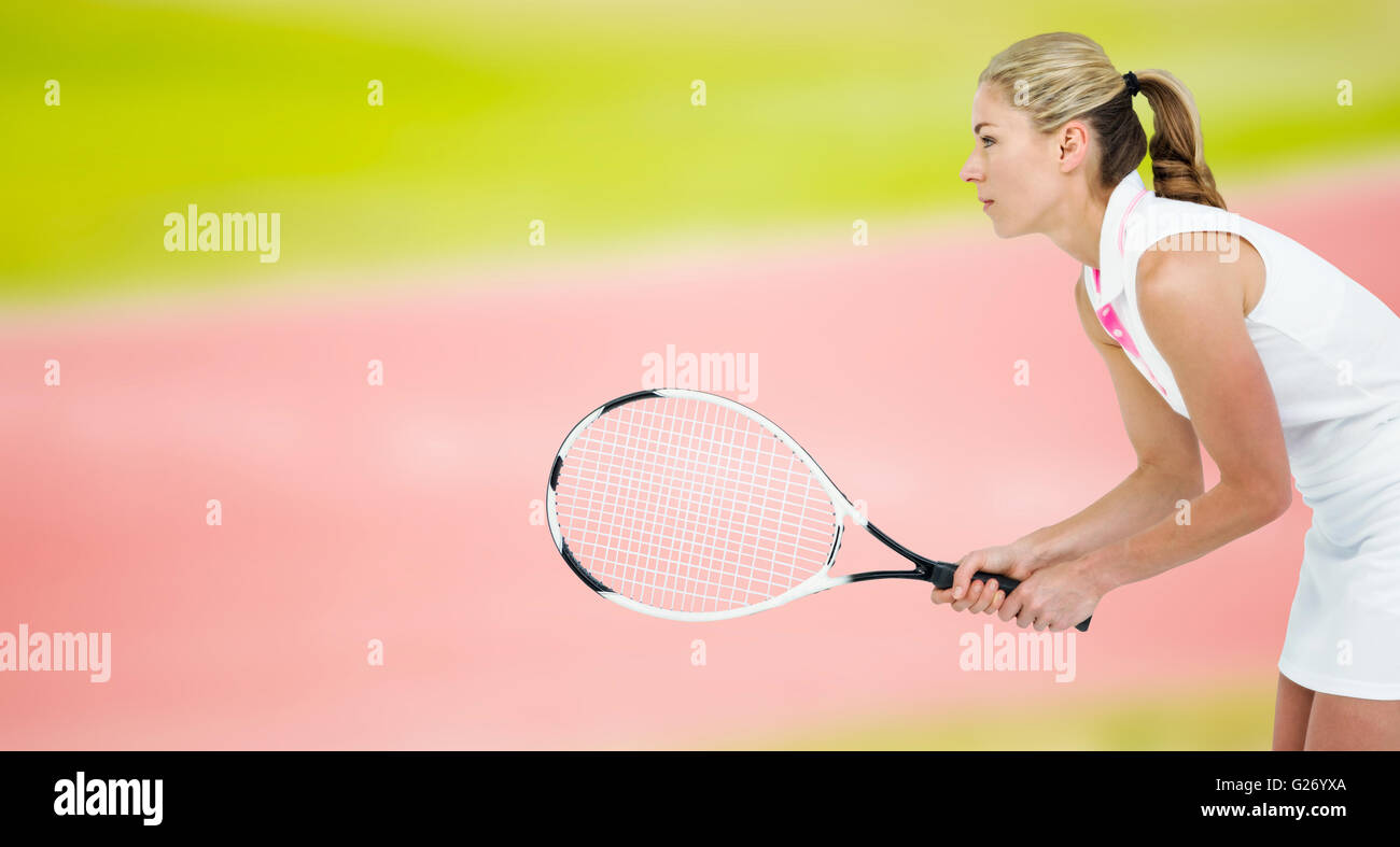 Composite image of athlete playing tennis with a racket Stock Photo - Alamy