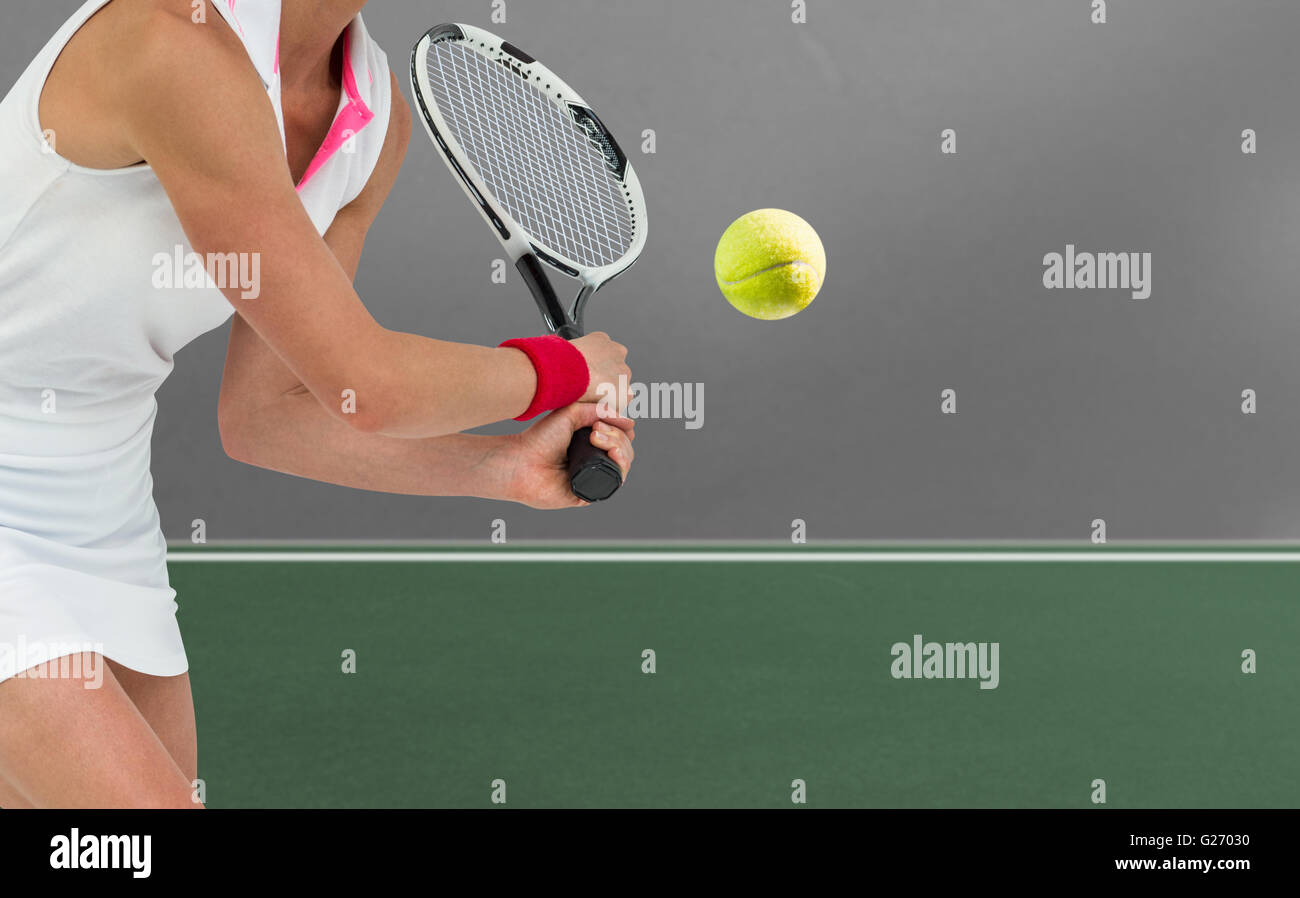 Composite image of athlete playing tennis with a racket Stock Photo - Alamy