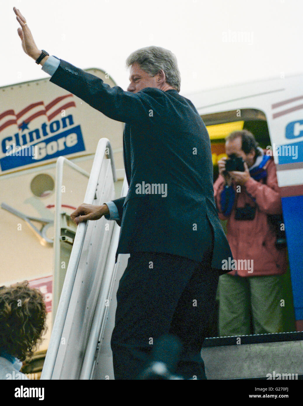 Governor William Clinton waves to the crowd at the Denver AIrport ...