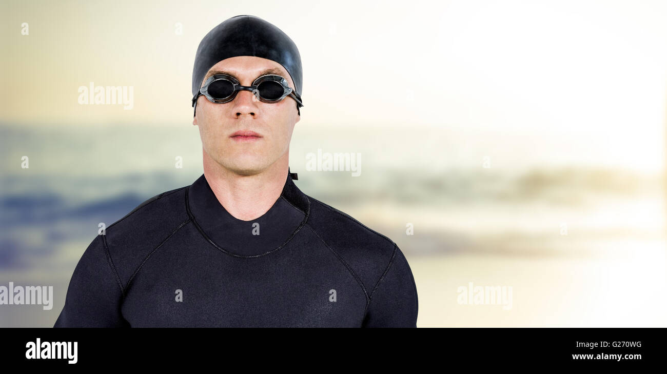 Composite image of close-up of confident swimmer in wetsuit Stock Photo ...