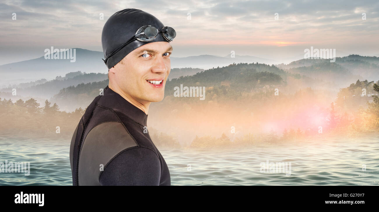 Composite image of close-up of confident swimmer in wetsuit Stock Photo ...