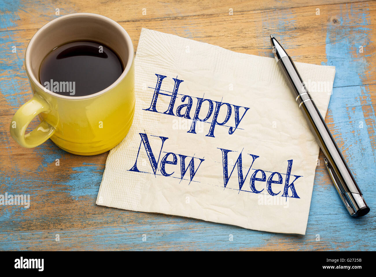 Happy New Week - cheerful handwriting on a napkin with a cup of coffee ...