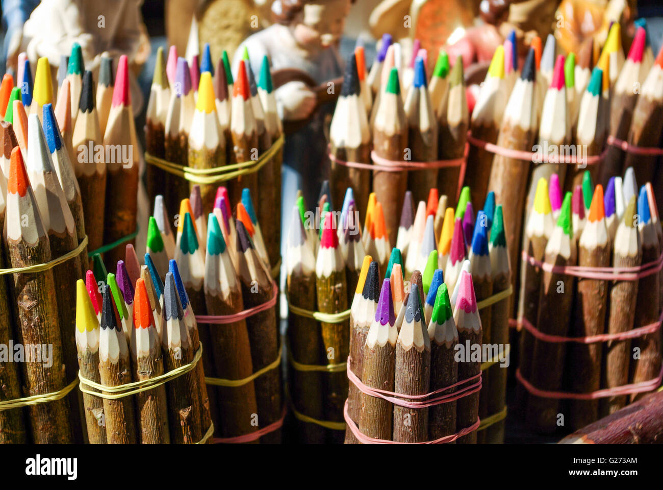 wood covered colorful pencils tied in bundles Stock Photo - Alamy