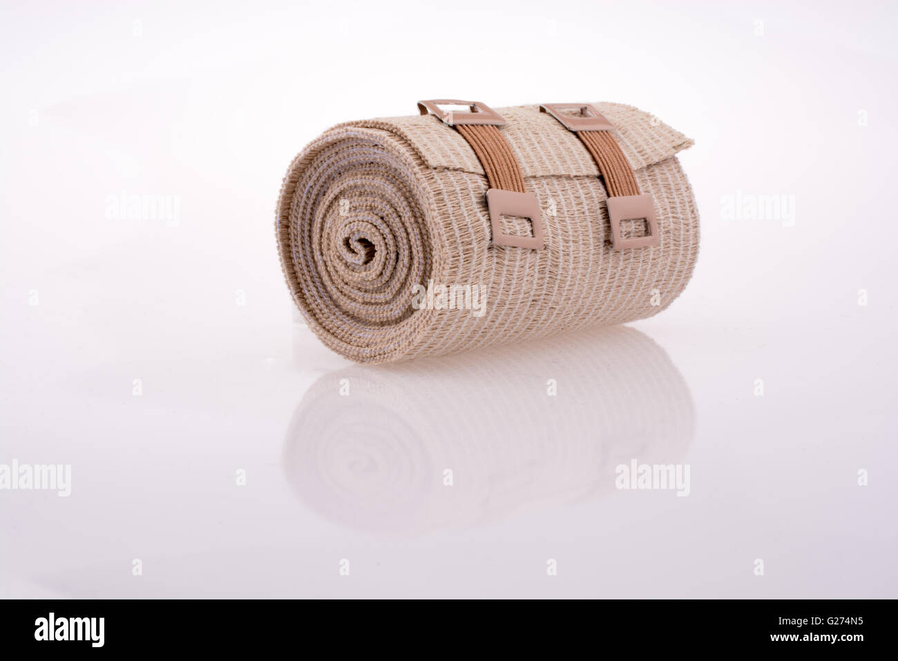 Rolled bandage on a white background Stock Photo - Alamy