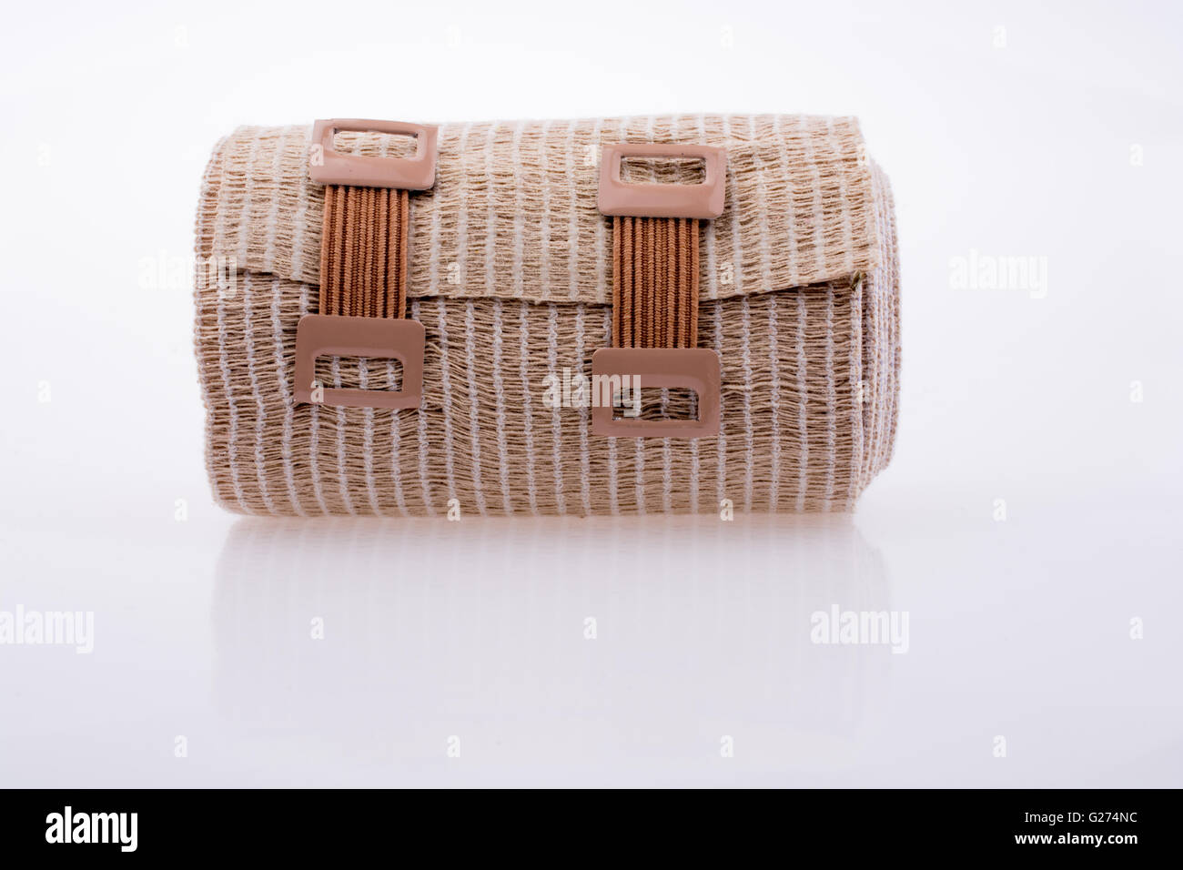 Rolled bandage on a white background Stock Photo - Alamy