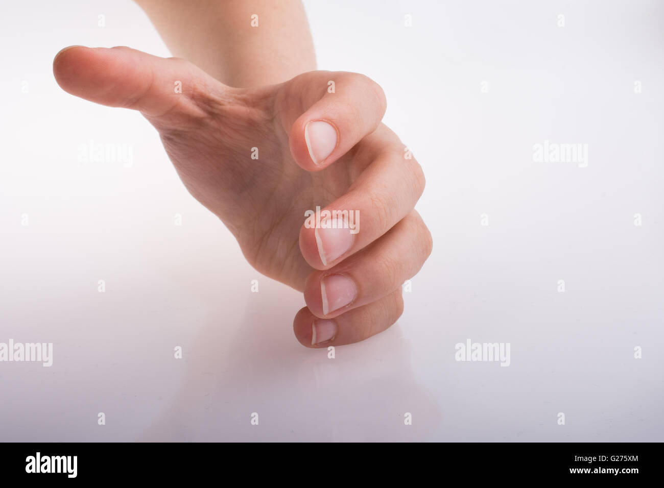 Hand holding on a white background Stock Photo - Alamy
