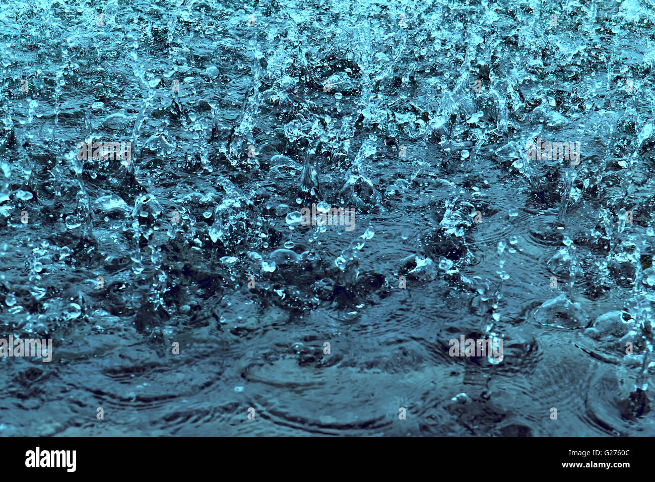 raindrops on water as background Stock Photo - Alamy