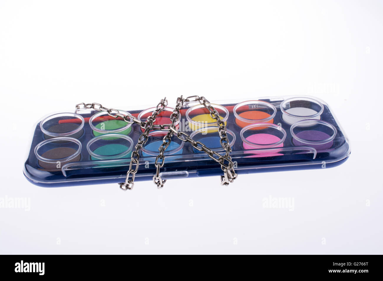 Watercolour paint set in chains on a white background Stock Photo - Alamy